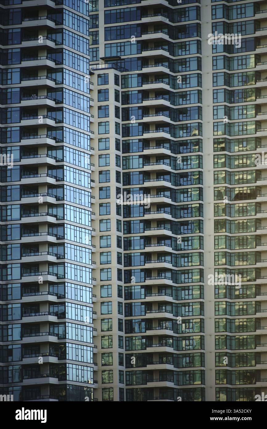 The modern high-rise facade of a residential and apartment building ...
