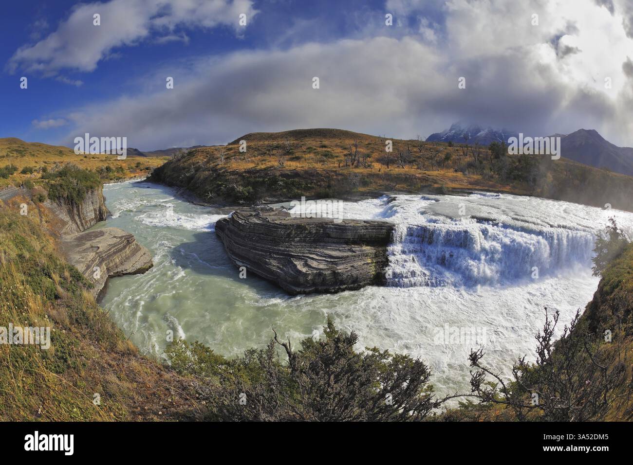 National Park Torres del Paine in Chile. Cascades Paine - a rock on the ...