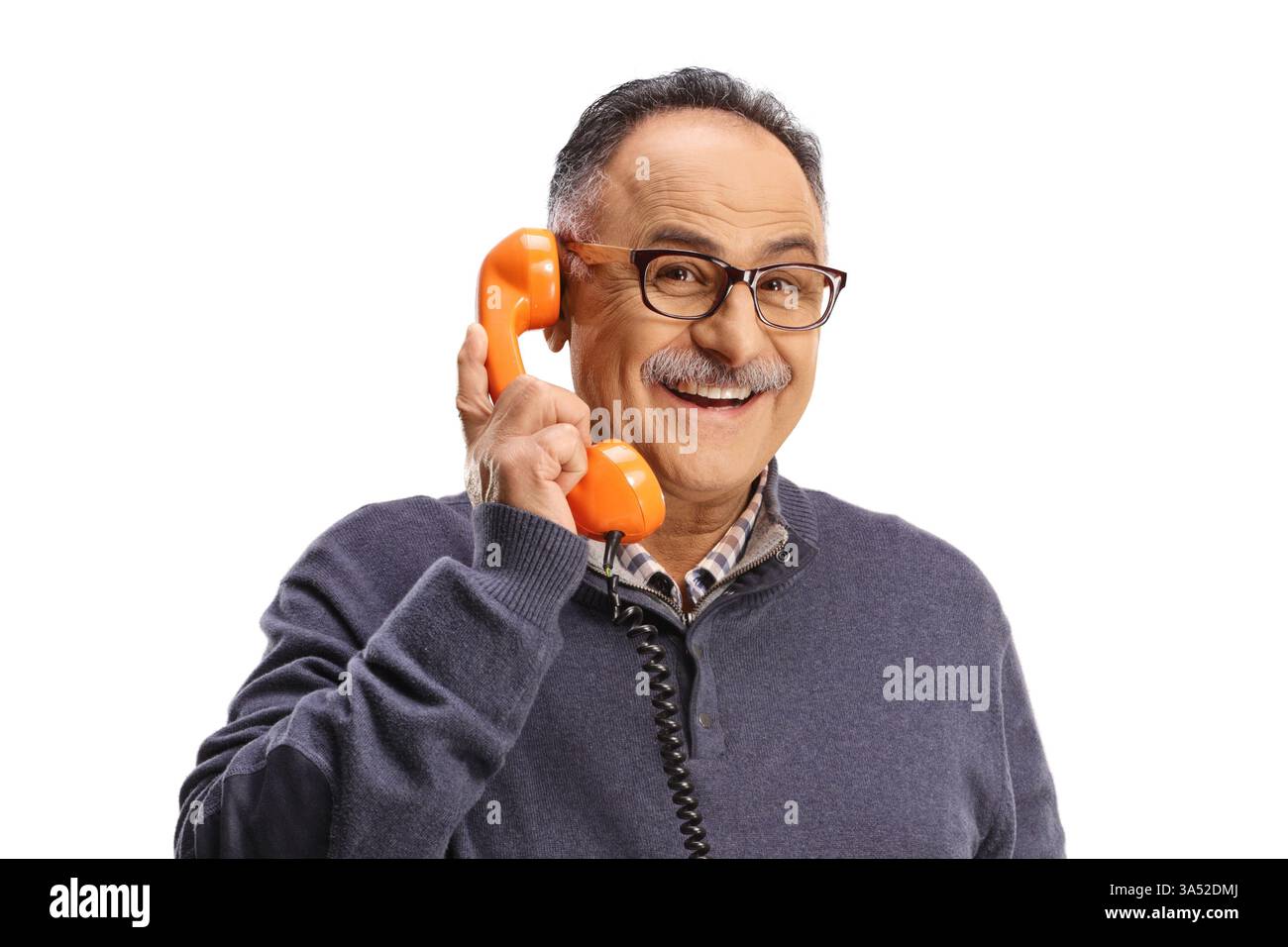 Cheerful mature man using a vintage rotary phone isolated on white ...