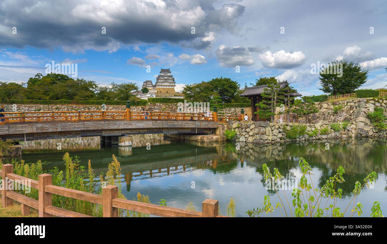 Himeji, Japan - Sep 24 2024, panoramic view of pond, bridge in front of ...