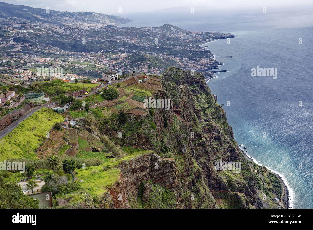 Coastal landscape with cliffs at the highest cape in Europe, tourist ...