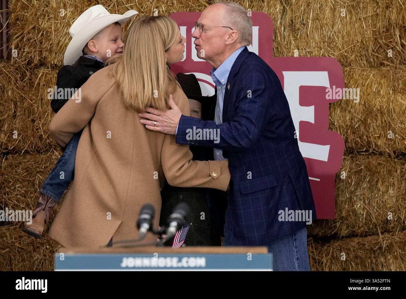 Rep. John Rose, R-Tenn., right, kisses his wife Chelsea Rose, left ...