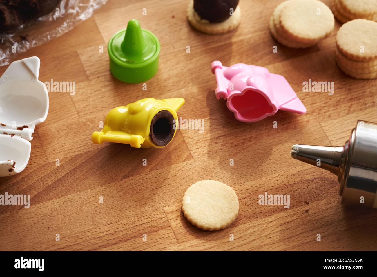Preparation of bunny and chicken shaped chocolate Easter cookies filled ...