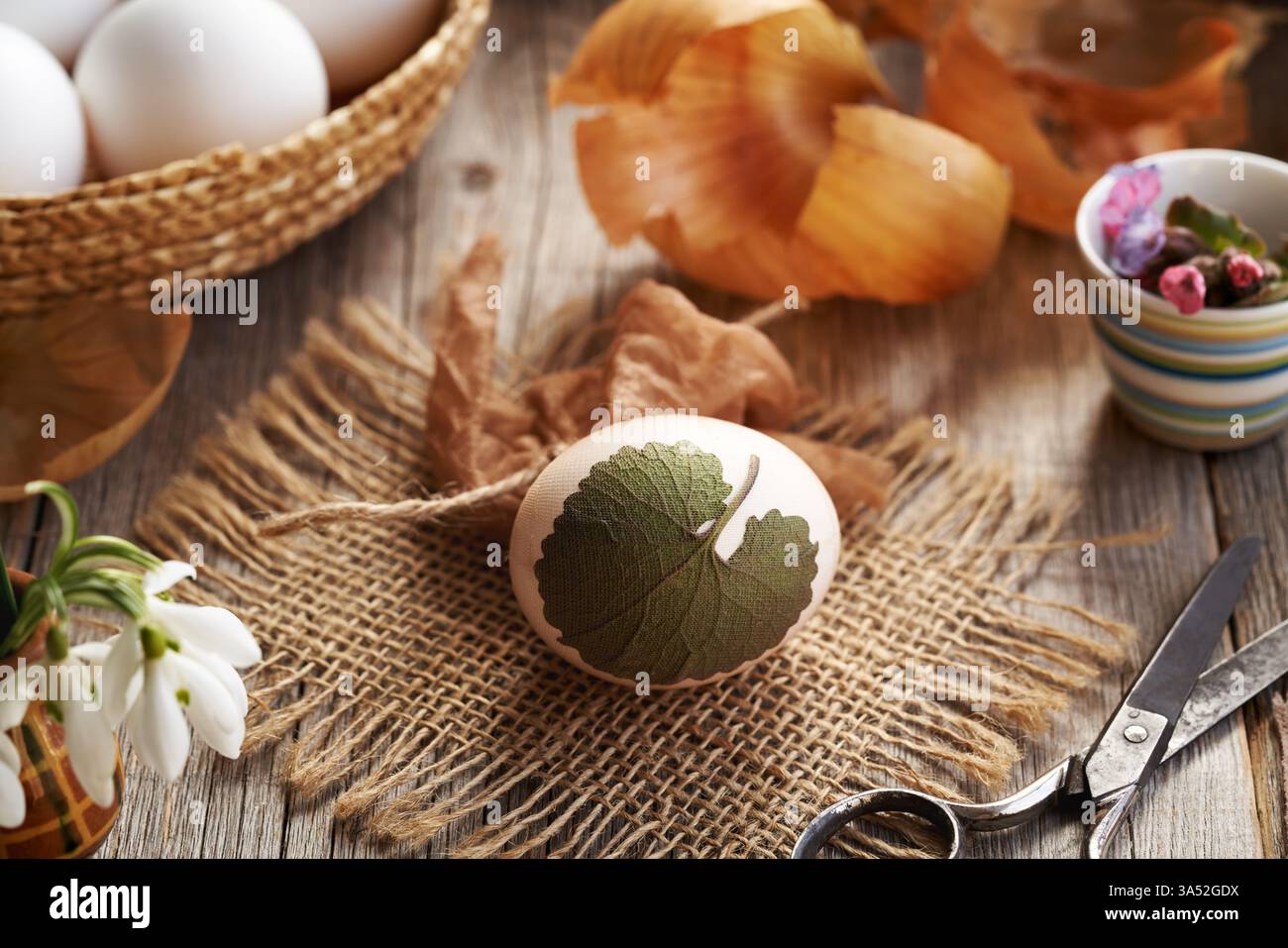 Preparation of Easter eggs for dyeing with onion peels with a pattern ...
