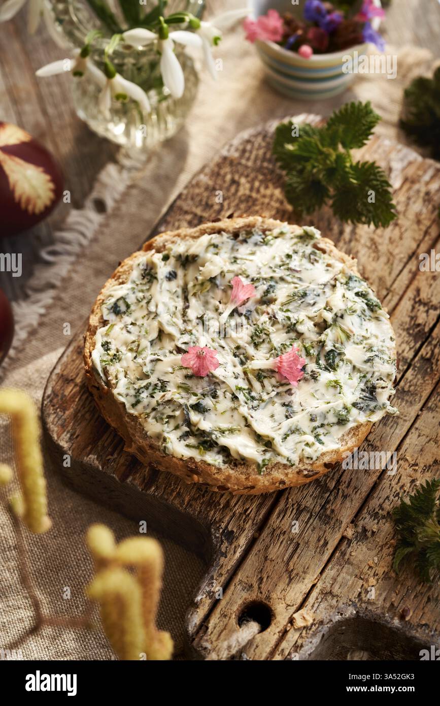 A slice of bread with nettle butter - homemade spread made of wild ...