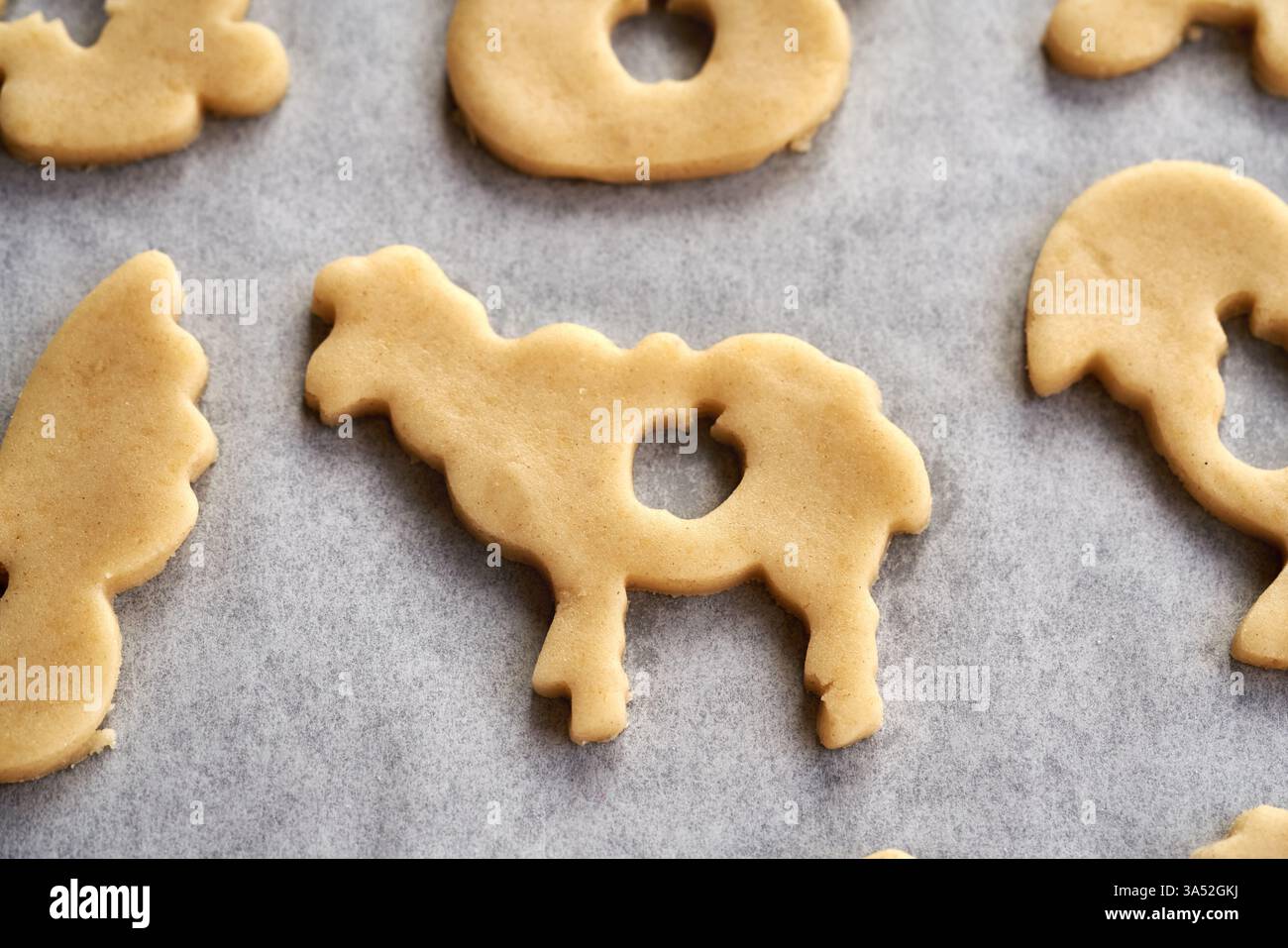Linzer Easter cookies in the shape of sheep and other animals cut out ...