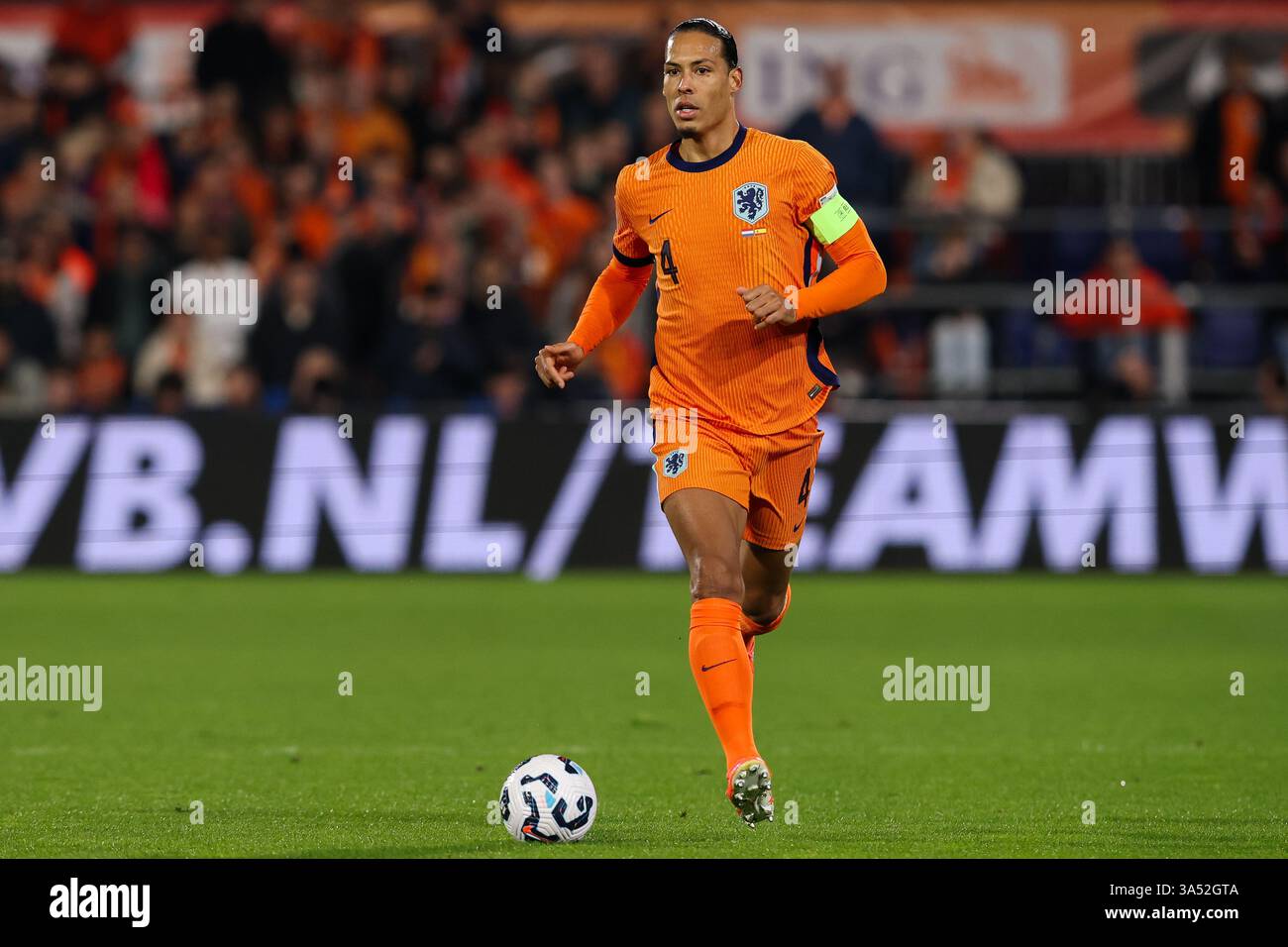 ROTTERDAM, NETHERLANDS - MARCH 20: Virgil van Dijk of Netherlands runs ...