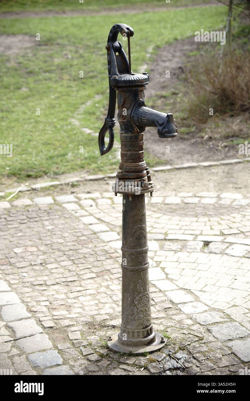 An old, rusty hand pump for pumping groundwater Stock Photo - Alamy