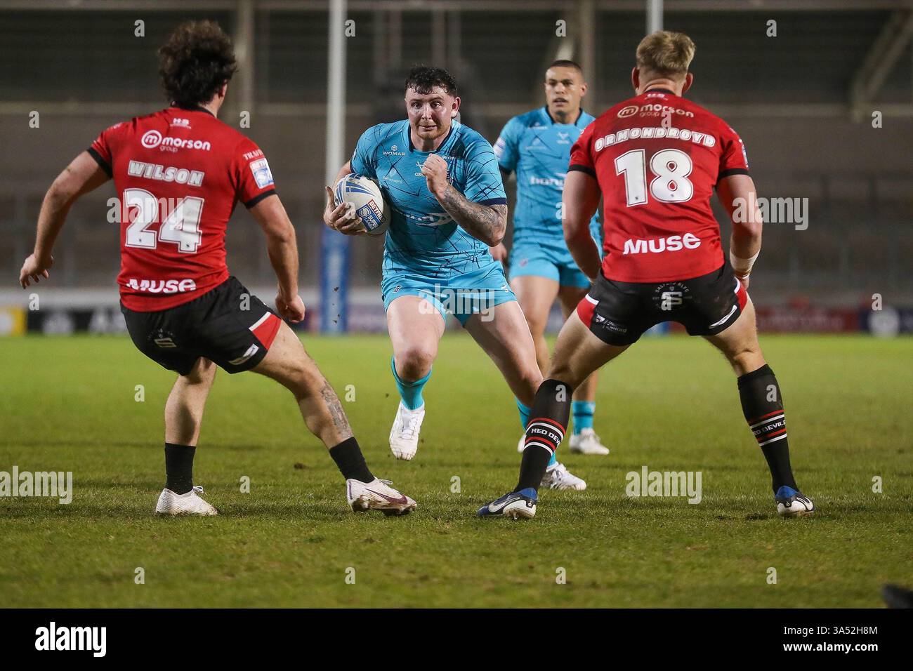 Fenton Rogers on a run *** during the Super League match between Wigan ...