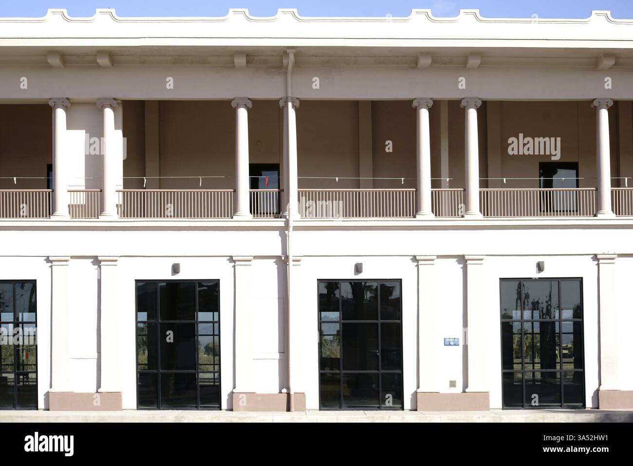 The entrance hall of a southern-style building with glass doors Stock ...