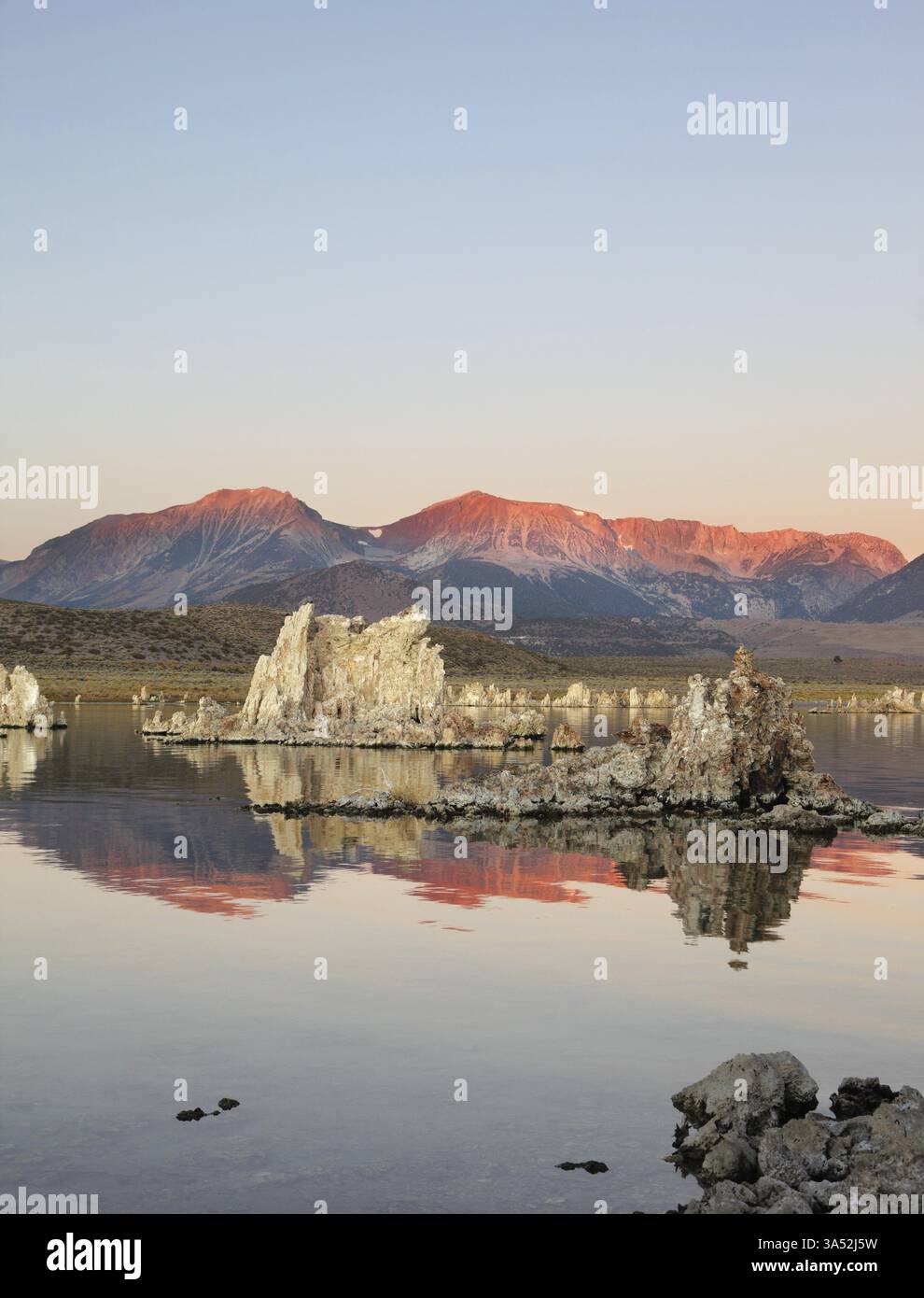 Shallow lake, a multitude of picturesque reefs Tufa. Magically ...