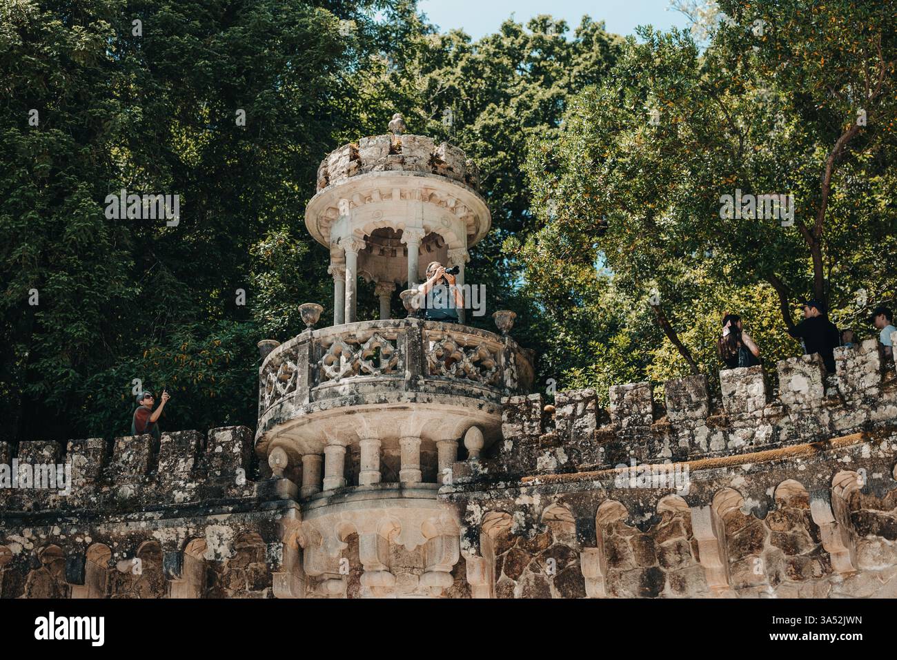 Photographer in gothic turret in forest in Sintra, Portugal Stock Photo ...