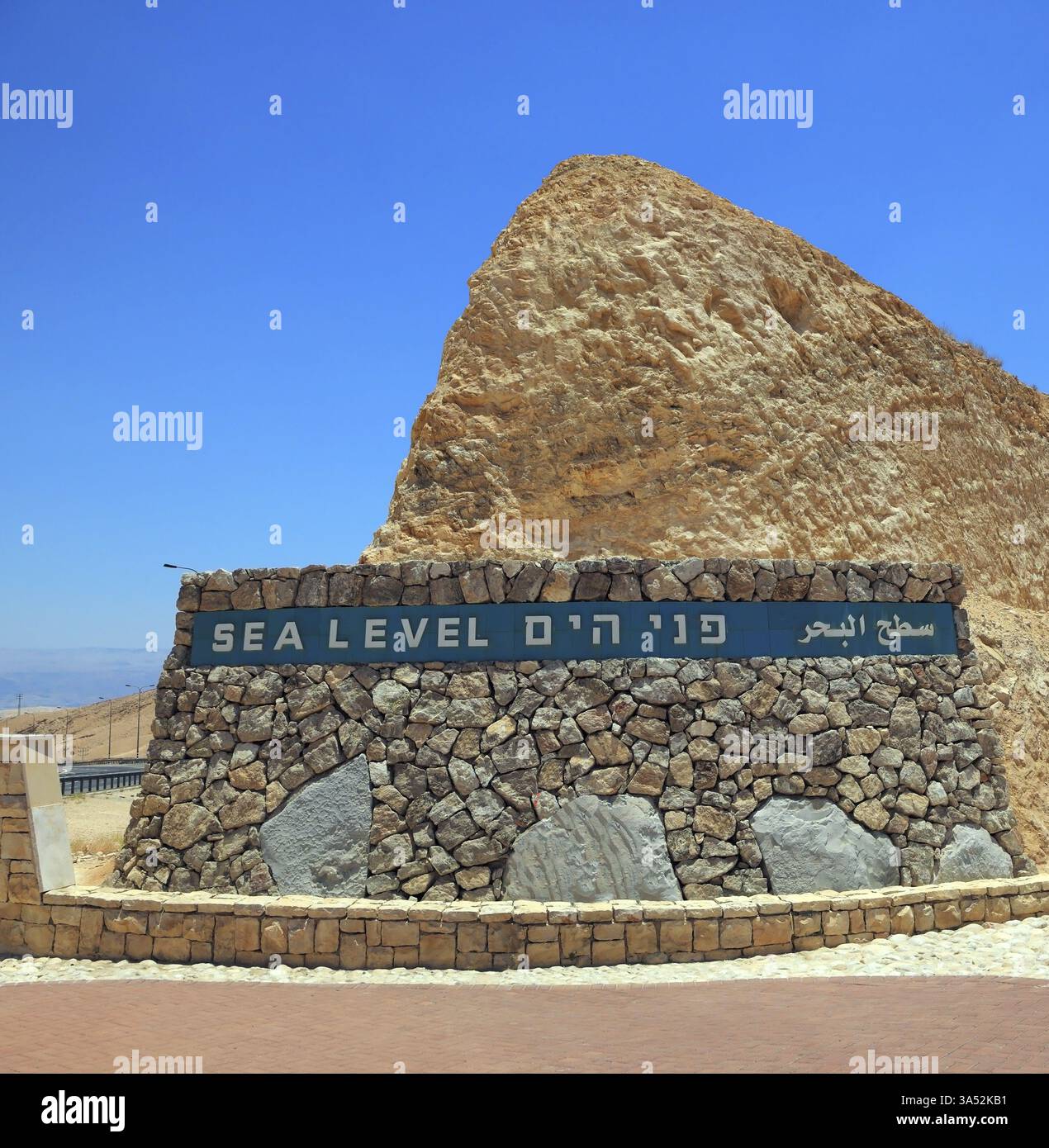 Highway built in the valley of the Dead Sea in Israel. On the side of a ...