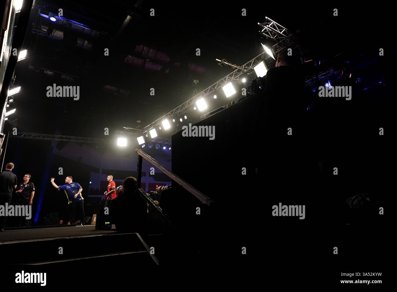 A general view of Luke Littler in action against Nathan Aspinall during ...
