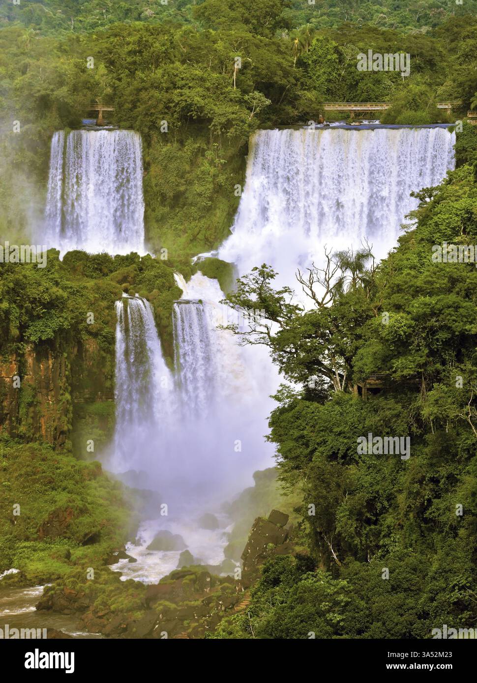 The grand Iguazu Falls on the Brazilian side. Multi-tiered cascades of ...