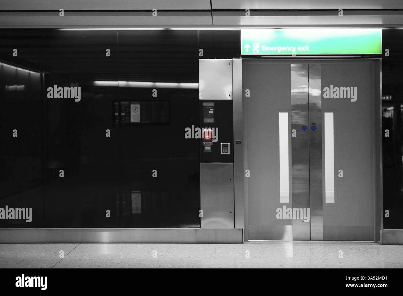 The shiny automatic door of a lift used as an emergency exit Stock ...