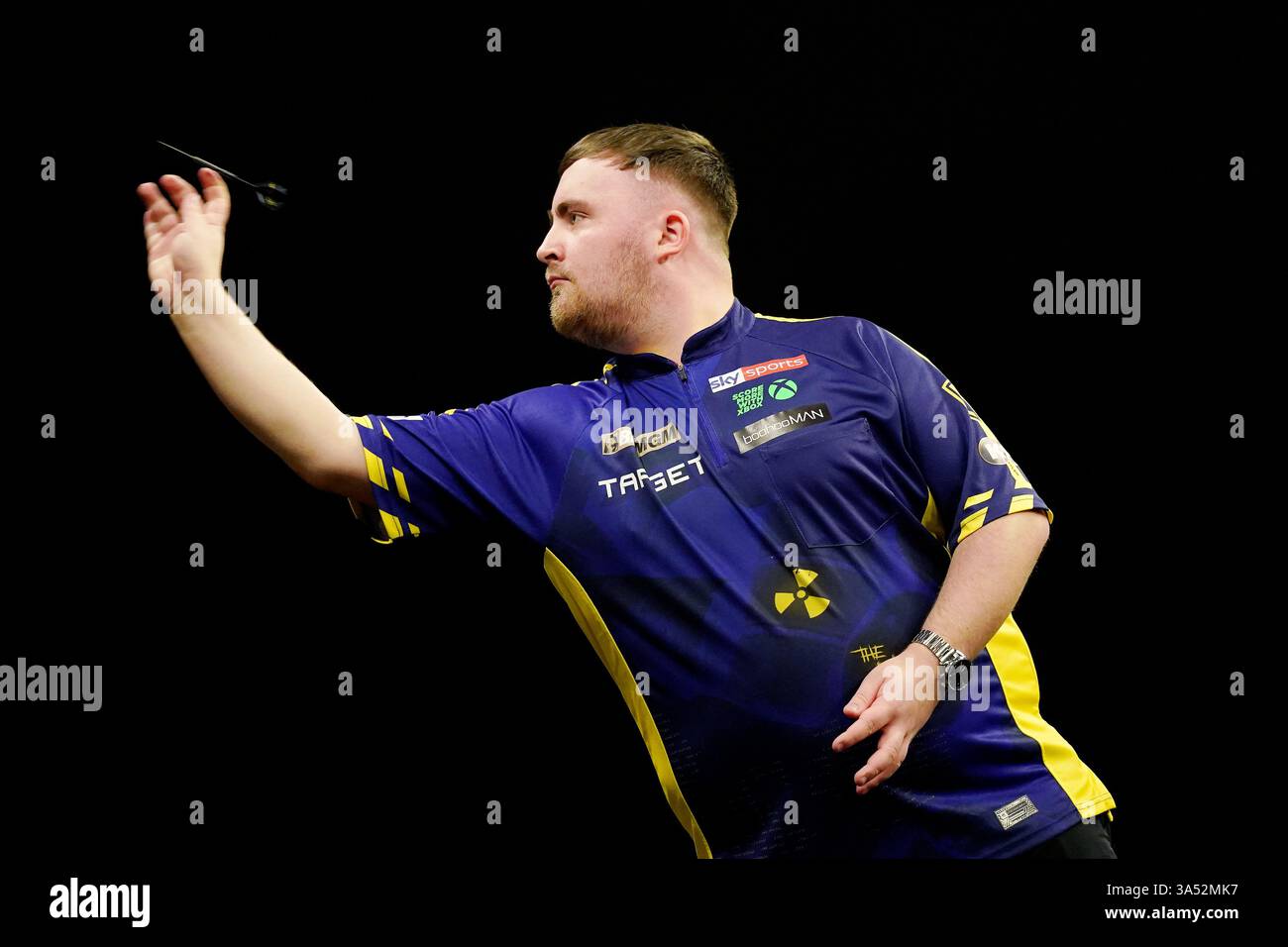 Luke Littler in action against Nathan Aspinall during night seven of ...