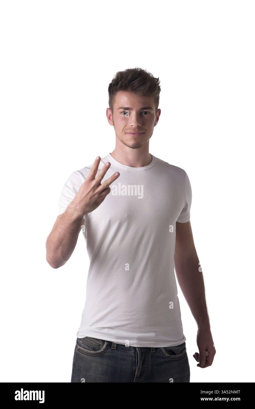 Attractive young man counting to three 3 with fingers and hands ...