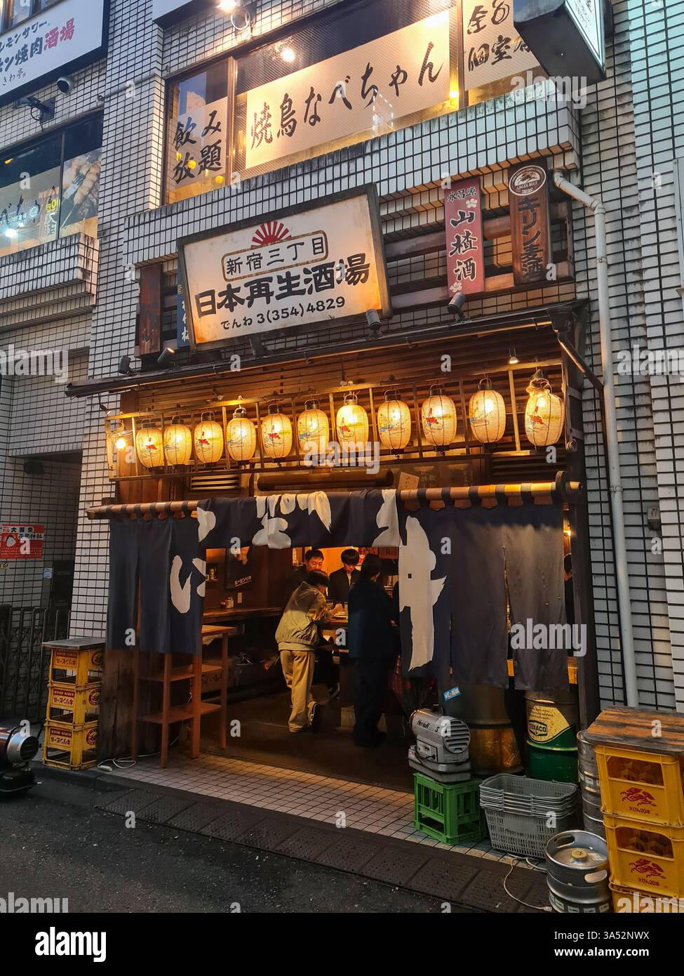 An Izakaya style bar in Shinjuku, Tokyo. The name of the bar is Nihon ...