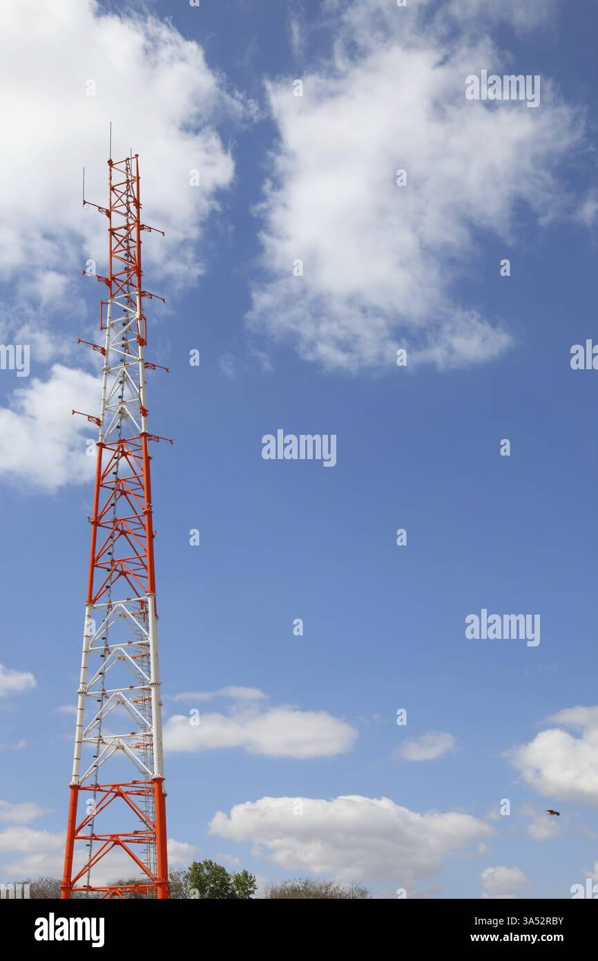 Aerial metallic red and white mast against the sky and clouds Stock ...