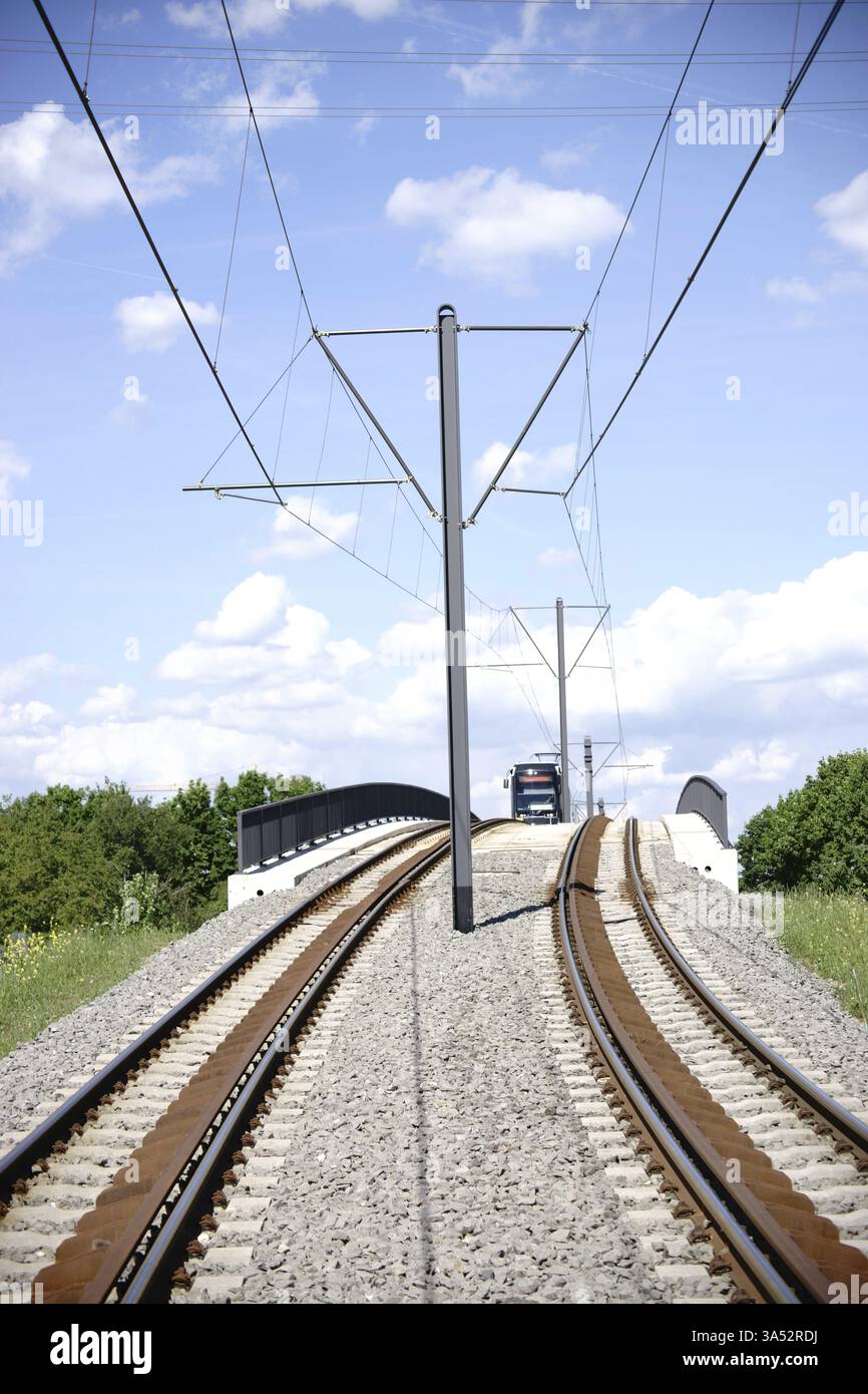 A tram crosses the bridgehead of a newly built bridge for trams Stock ...