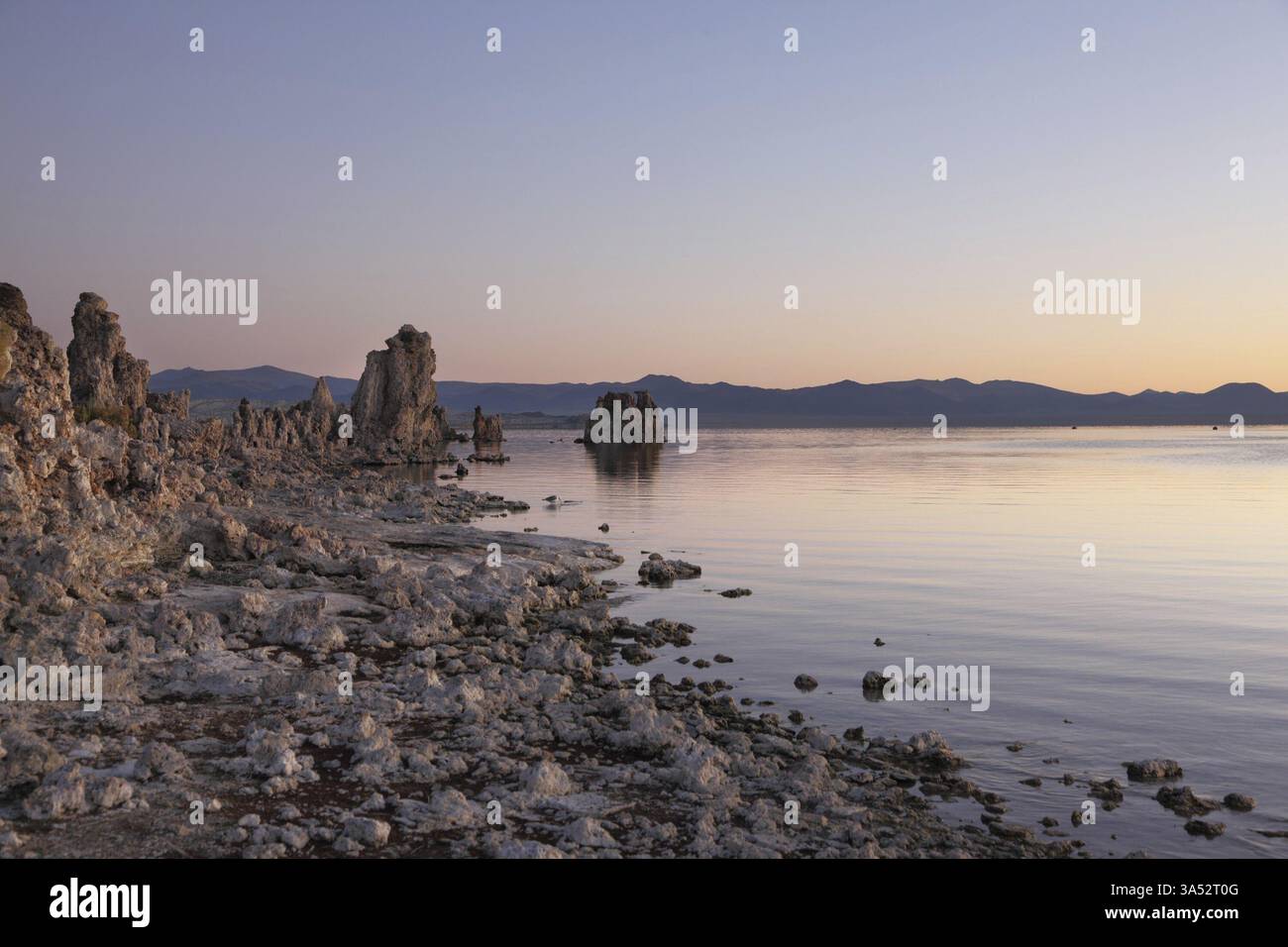 Sunrise on lake Mono in a crater of an ancient extinct volcano. Lake ...