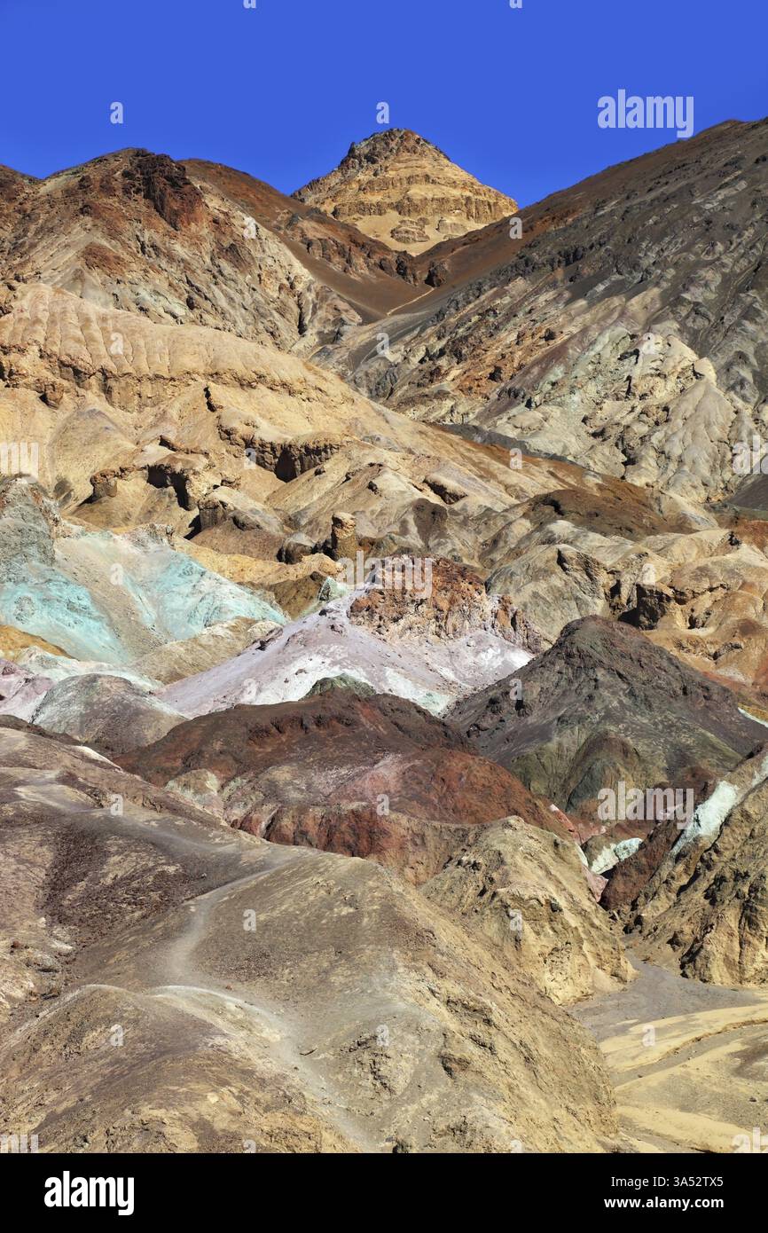 Multi-colored rocks in Death Valley, USA. The famous road Artists ...