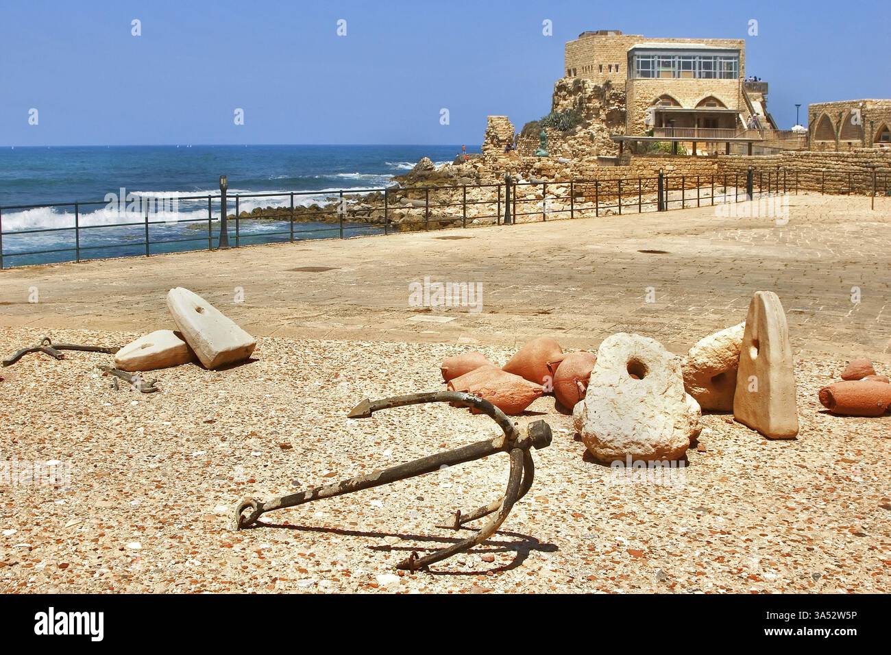 An ancient anchor and the processed stones from archeological ...