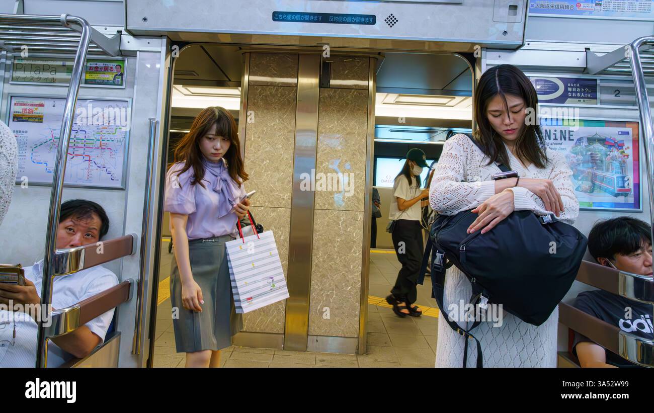 Osaka, Japan - Sep 25 2024, panoramic view from inside the subway train ...