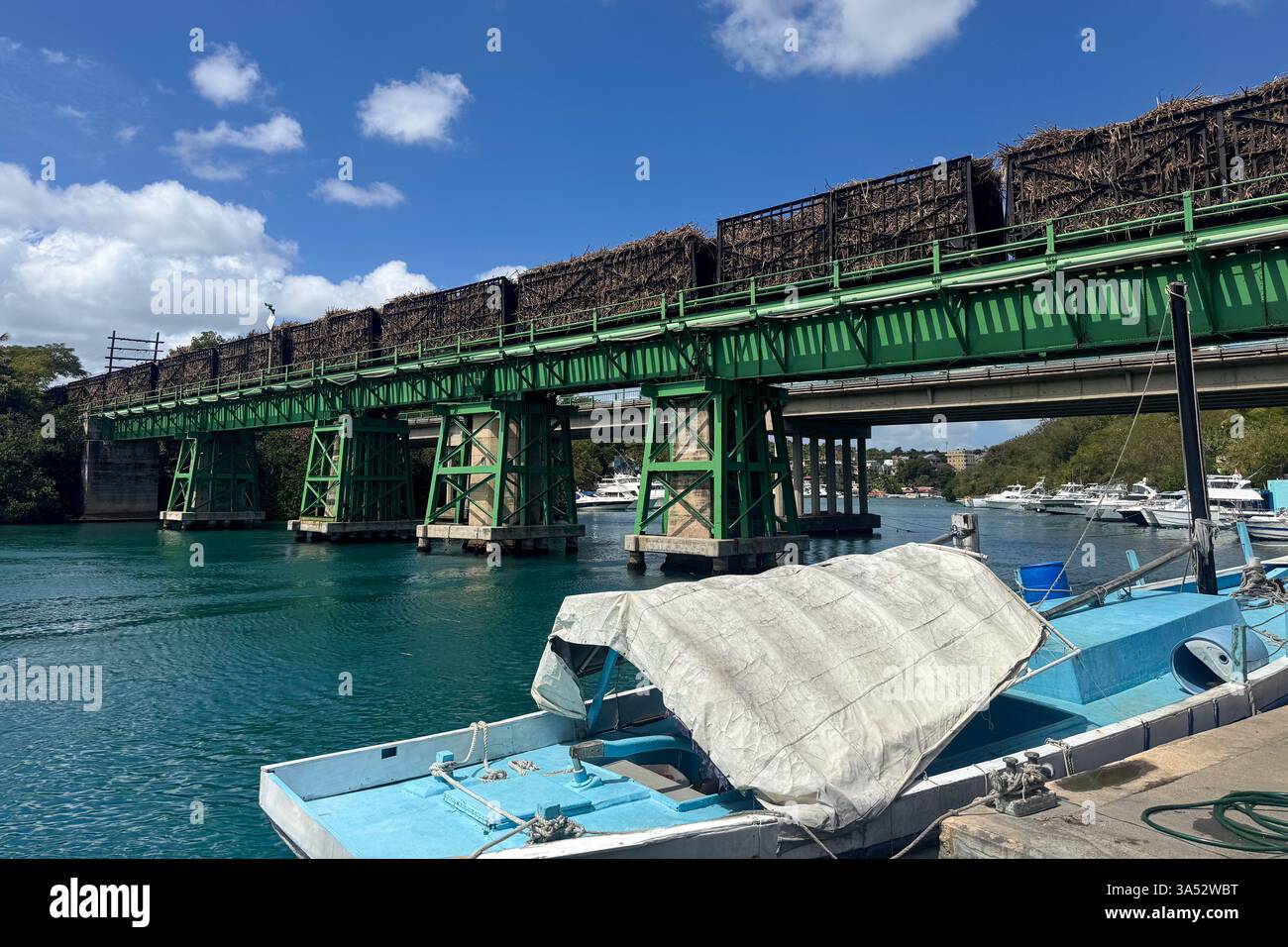 Sugar cane train on a bridge at the cruise terminal of La Romana in the ...