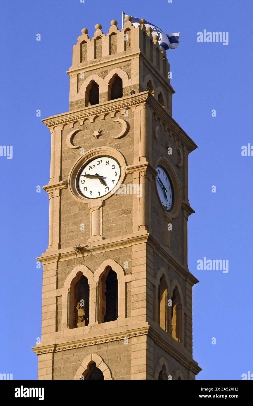 Clock tower in old Akko, with faces in Hebrew and Arabic, crowned with ...