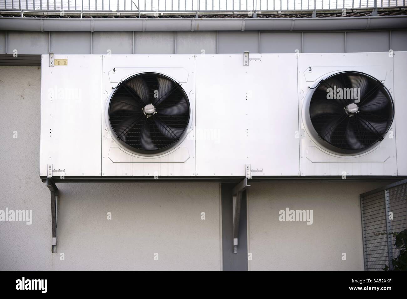The rear of large fans of an air conditioning system for ventilating a ...