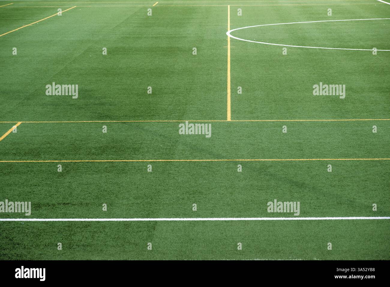 A close-up of an artificial turf pitch for football matches and ...