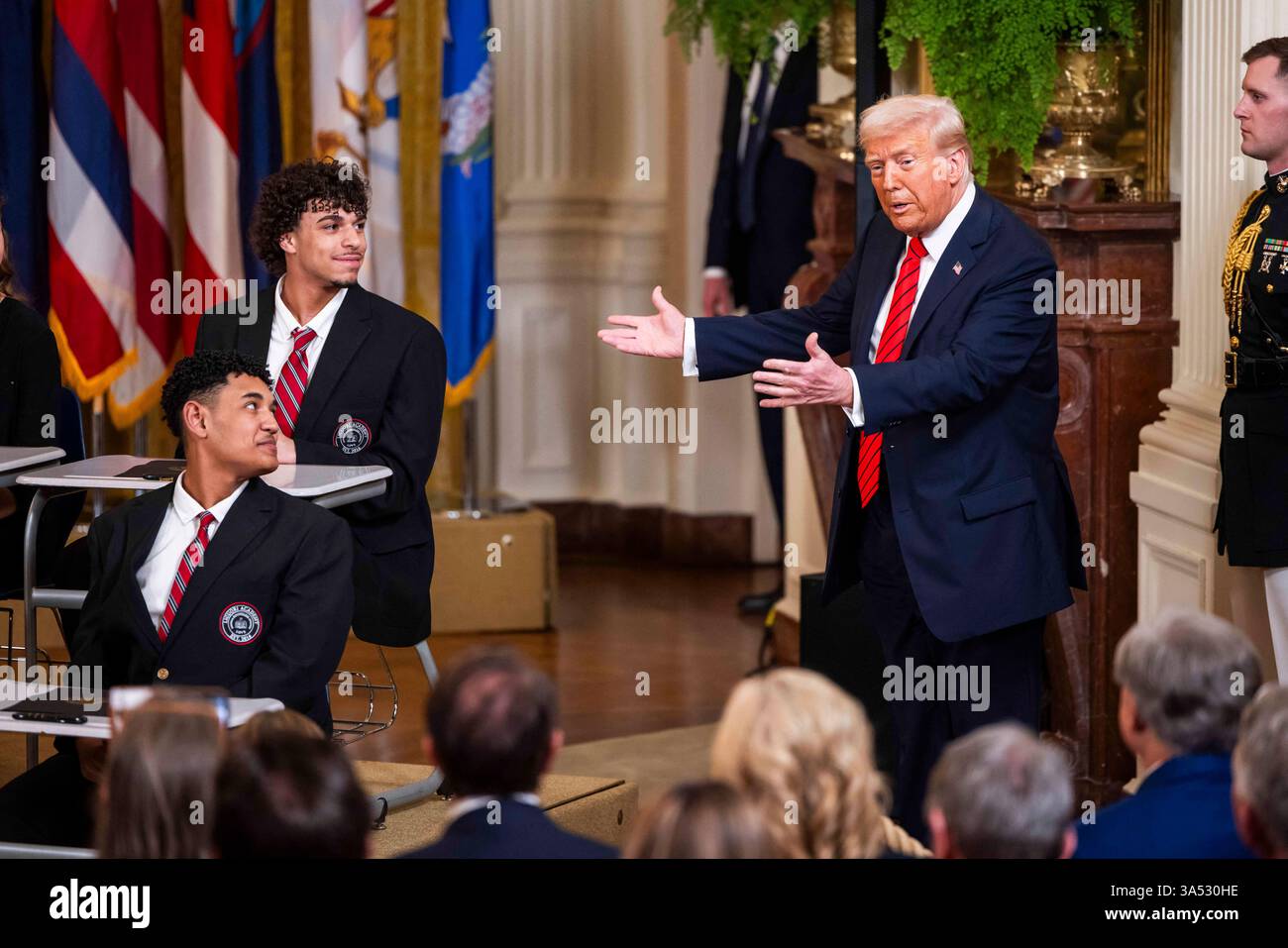 US President Donald Trump prepares to sign an executive order aimed at ...