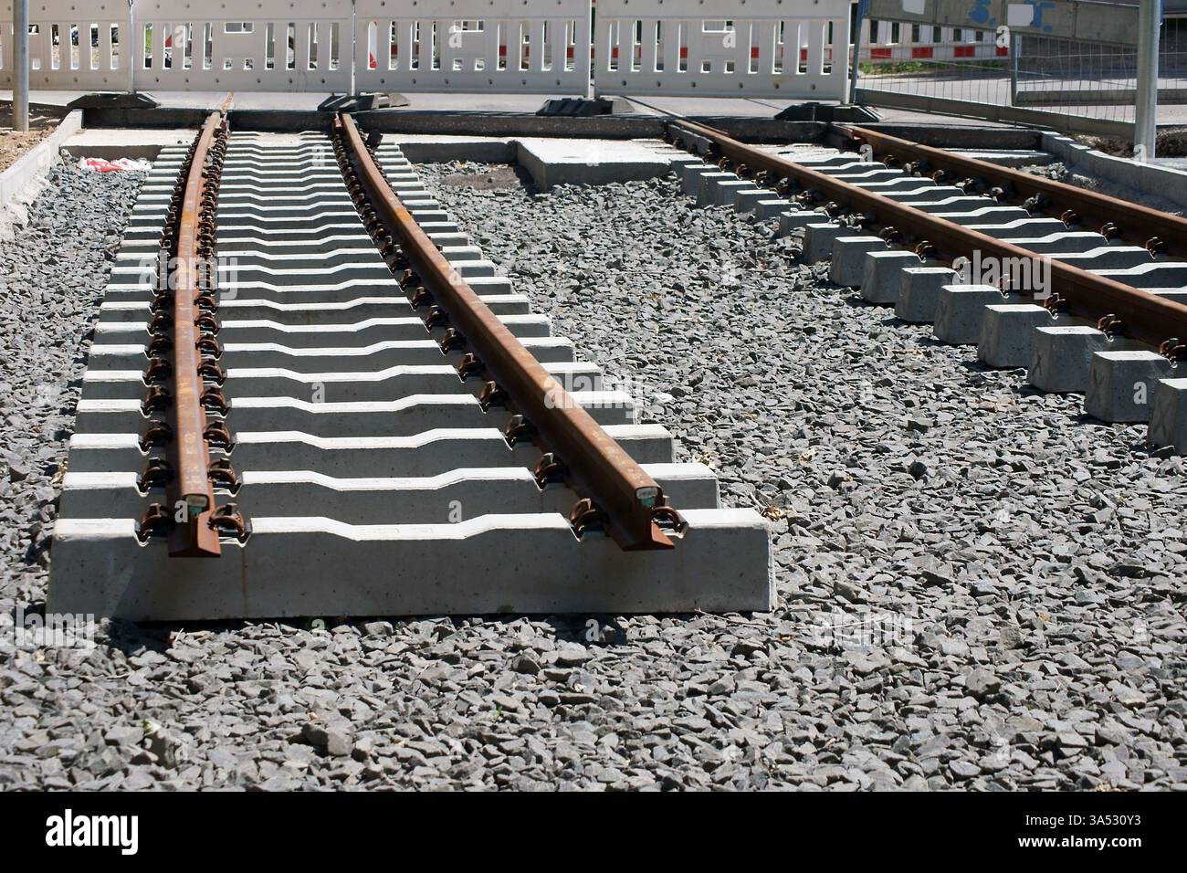 The construction of a railway line for a tram with rails, underlay and ...