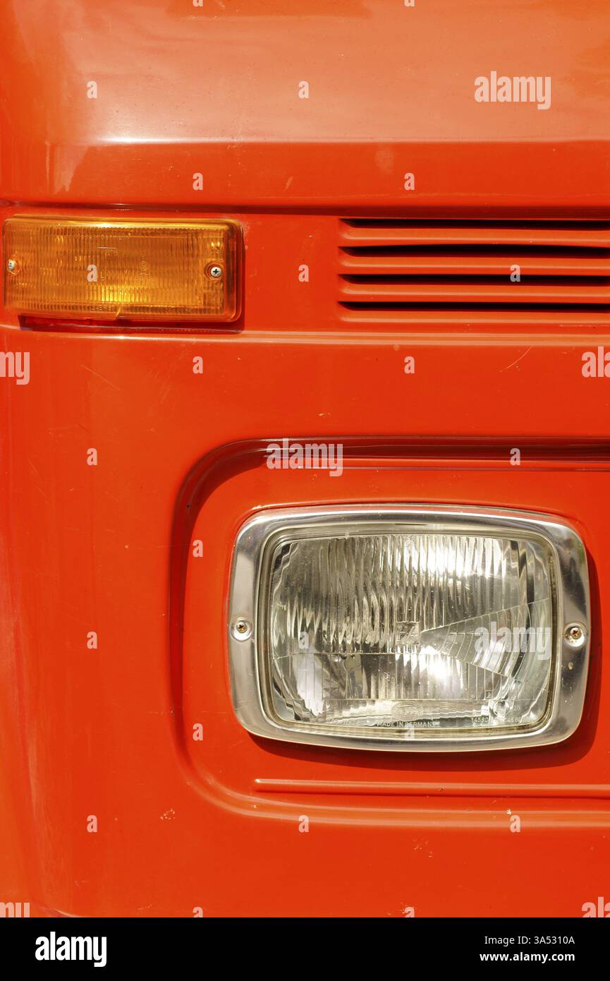 Close-up of the body of a fire engine in the sunshine with a front ...