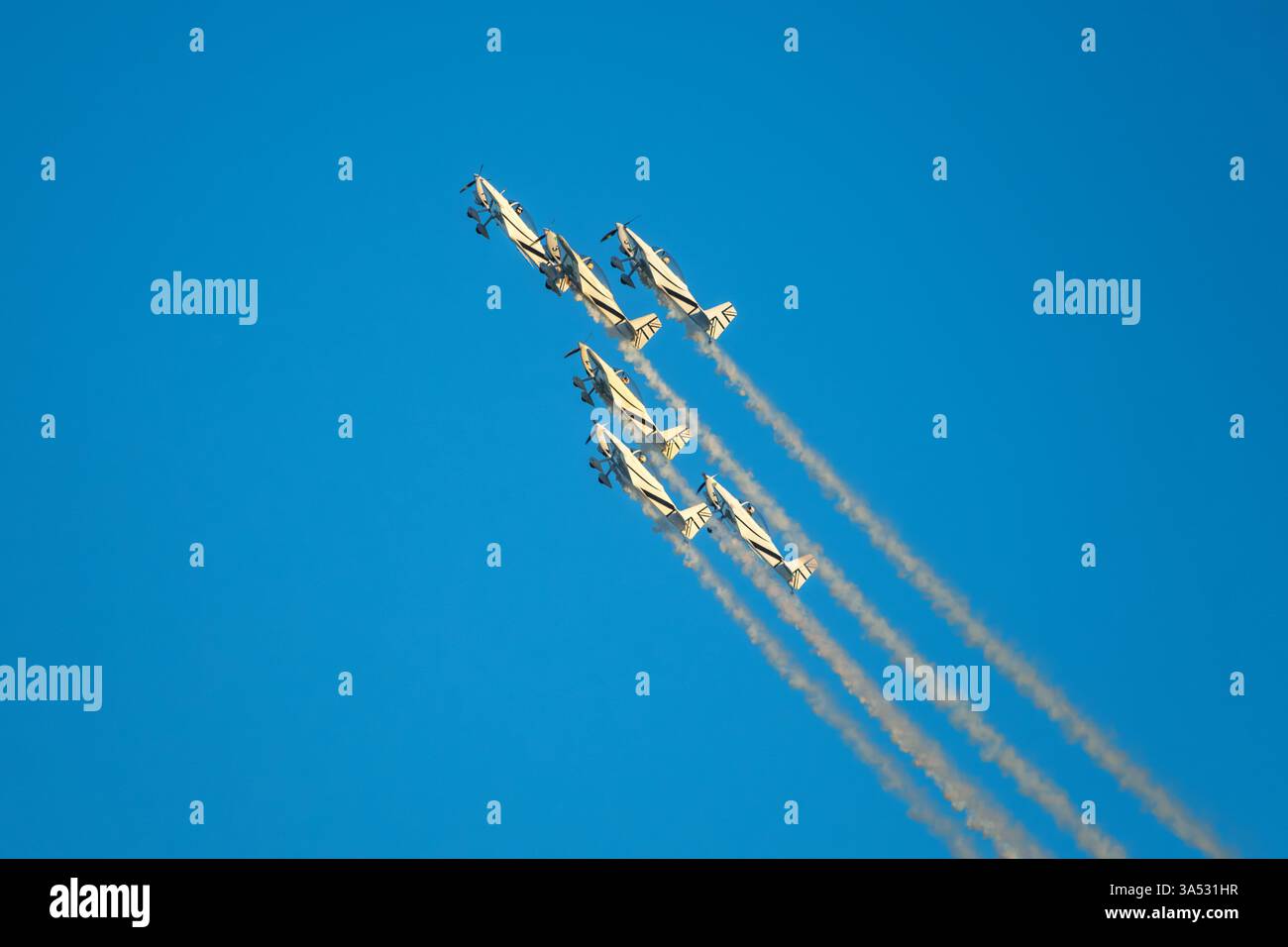 Stunt aerobatic planes performing stunts in air Stock Photo - Alamy
