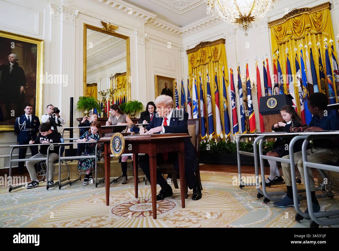 Washington, United States. 20th Mar, 2025. President Donald Trump signs ...