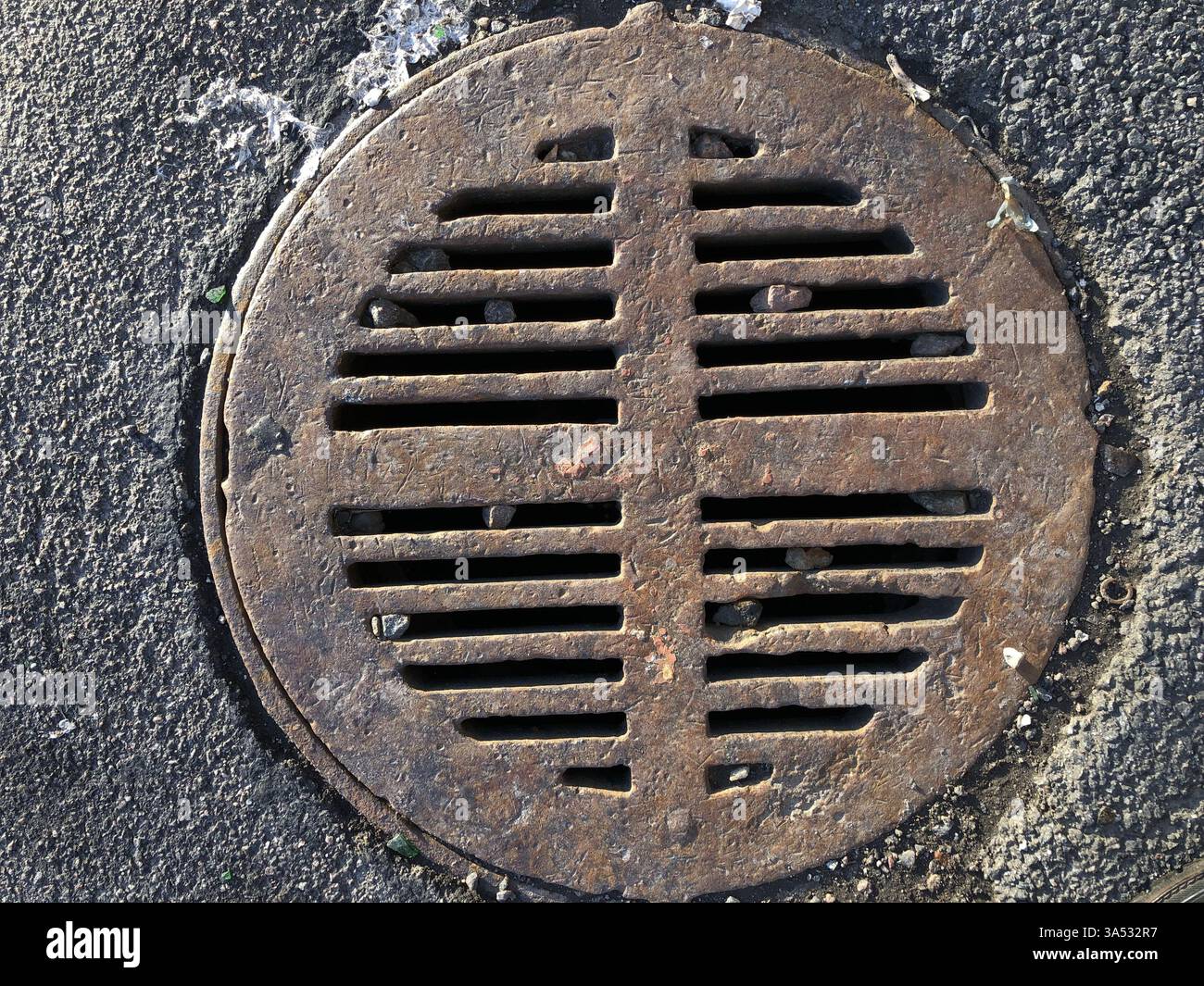 cast iron sewer manhole cover close-up Stock Photo - Alamy