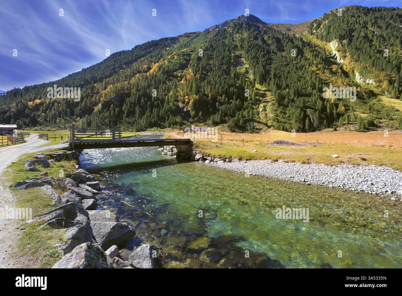 Starting famous Krimml waterfalls. Crystal clear water sparkles in the ...