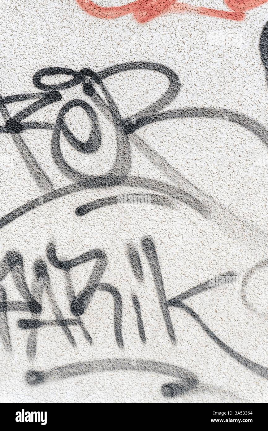 Colorful graffiti fills the wall, highlighting various artistic styles ...