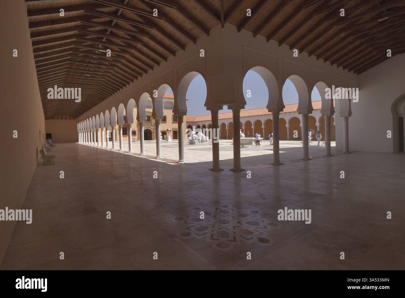 A court yard in the Spanish style, decorated by gallery, columns and ...