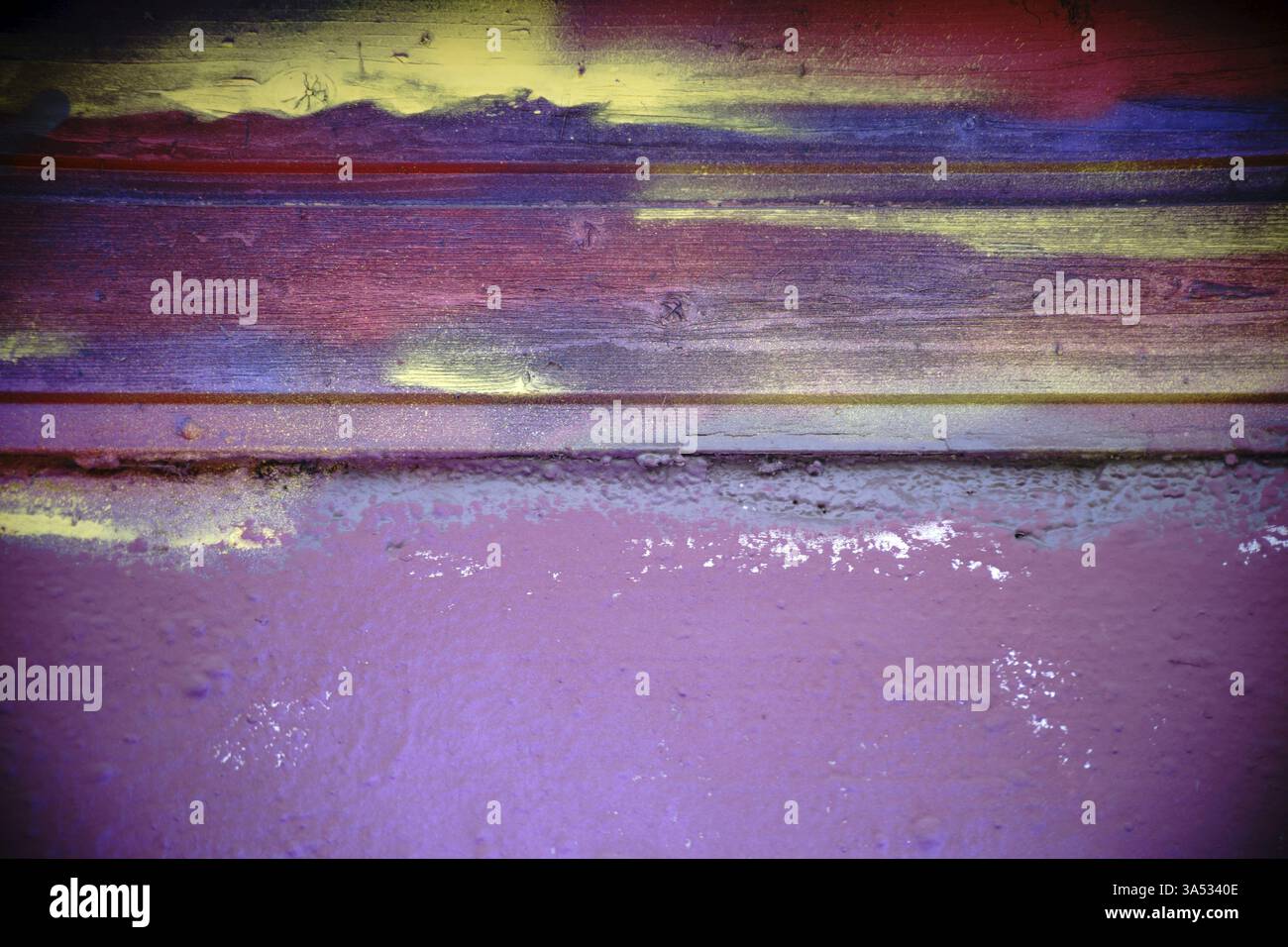 A close-up of the facade of a building with a colourfully painted ...