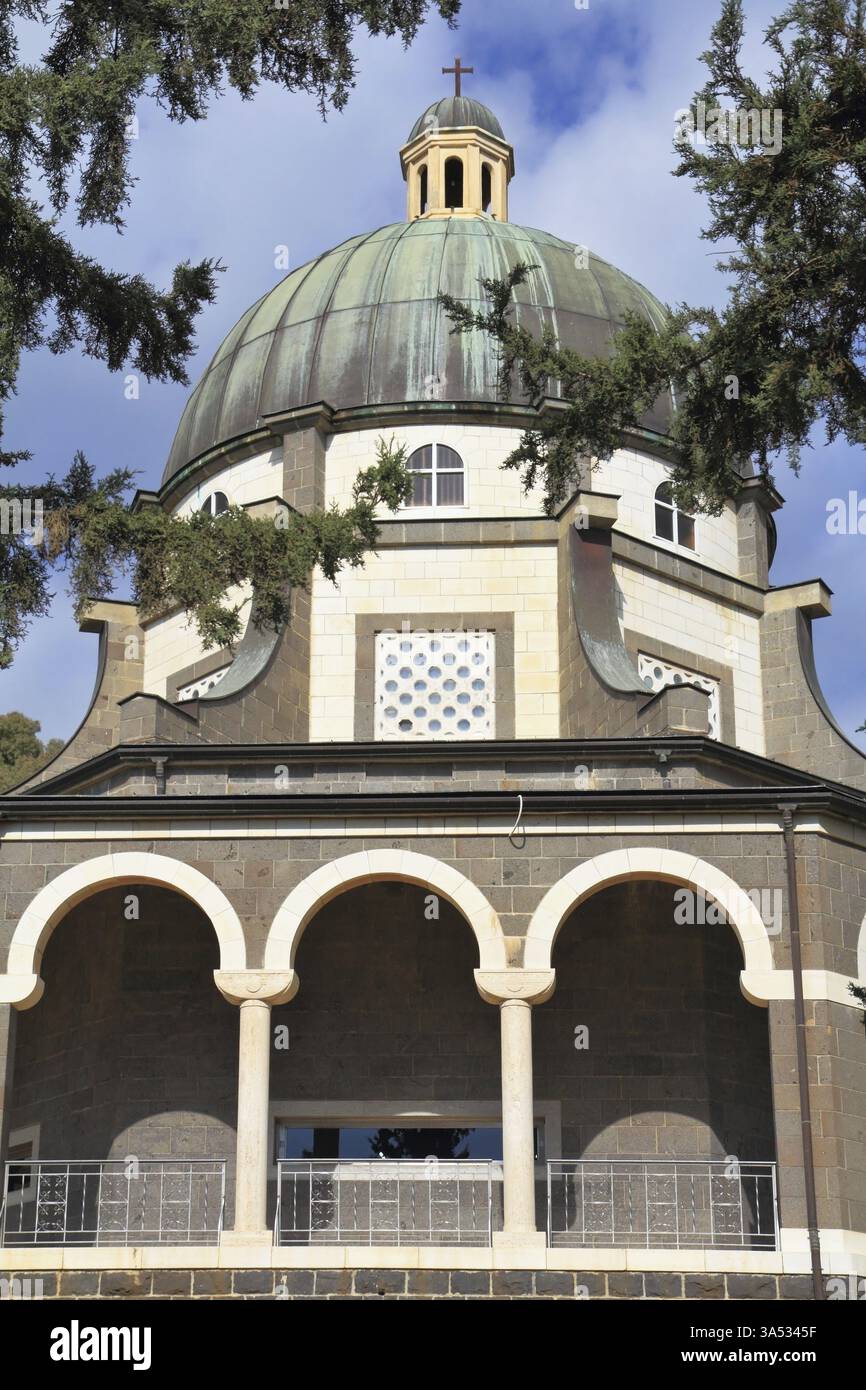 Basilica and colonnade, illuminated by the sun, at Mount Beatitudes ...