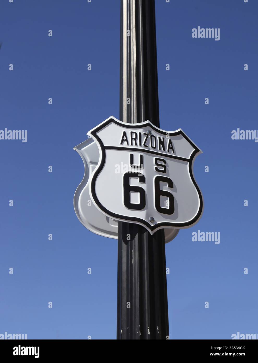 The traffic sign on American highway strengthened on a metal column ...