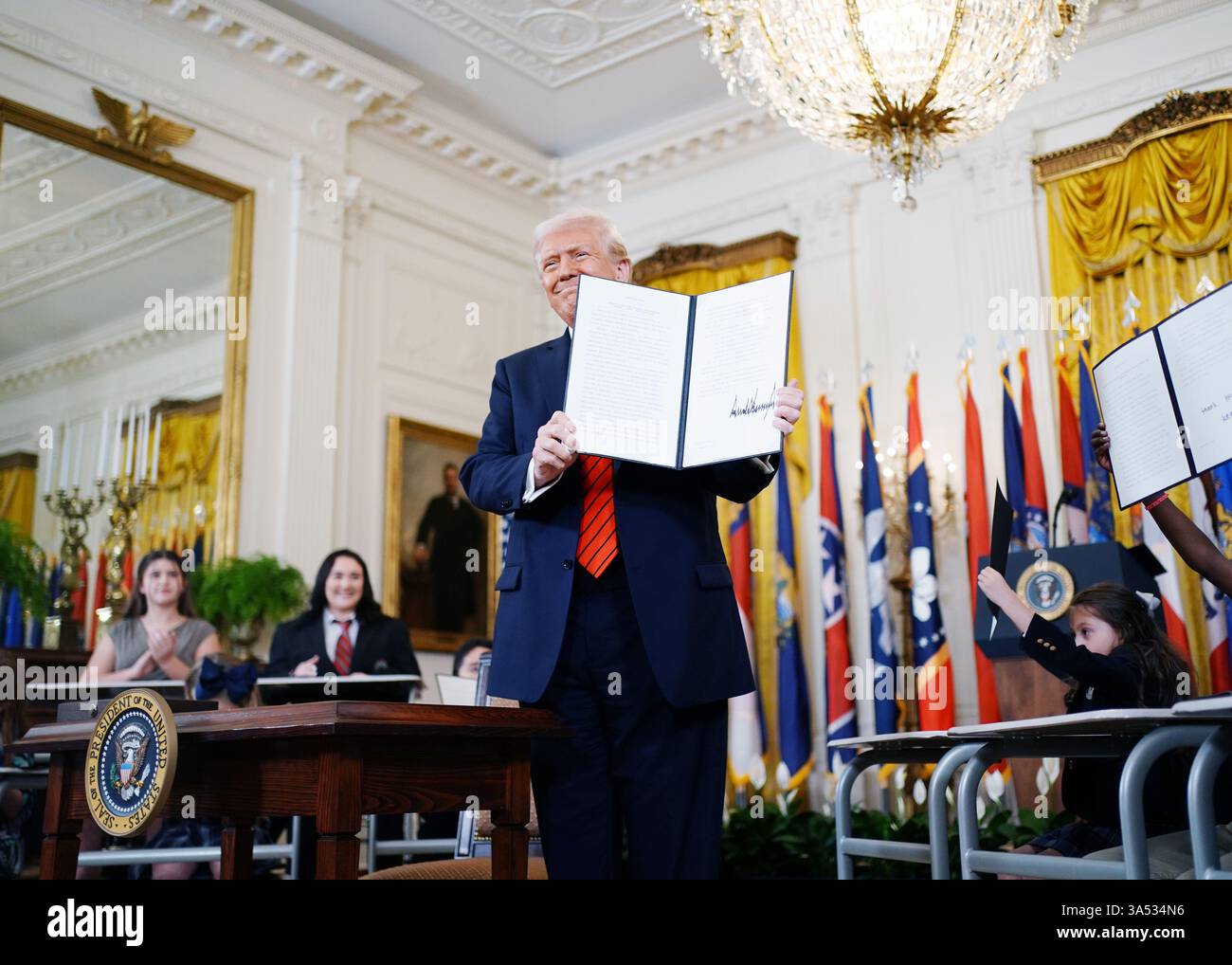 Washington, United States. 20th Mar, 2025. President Donald Trump holds ...