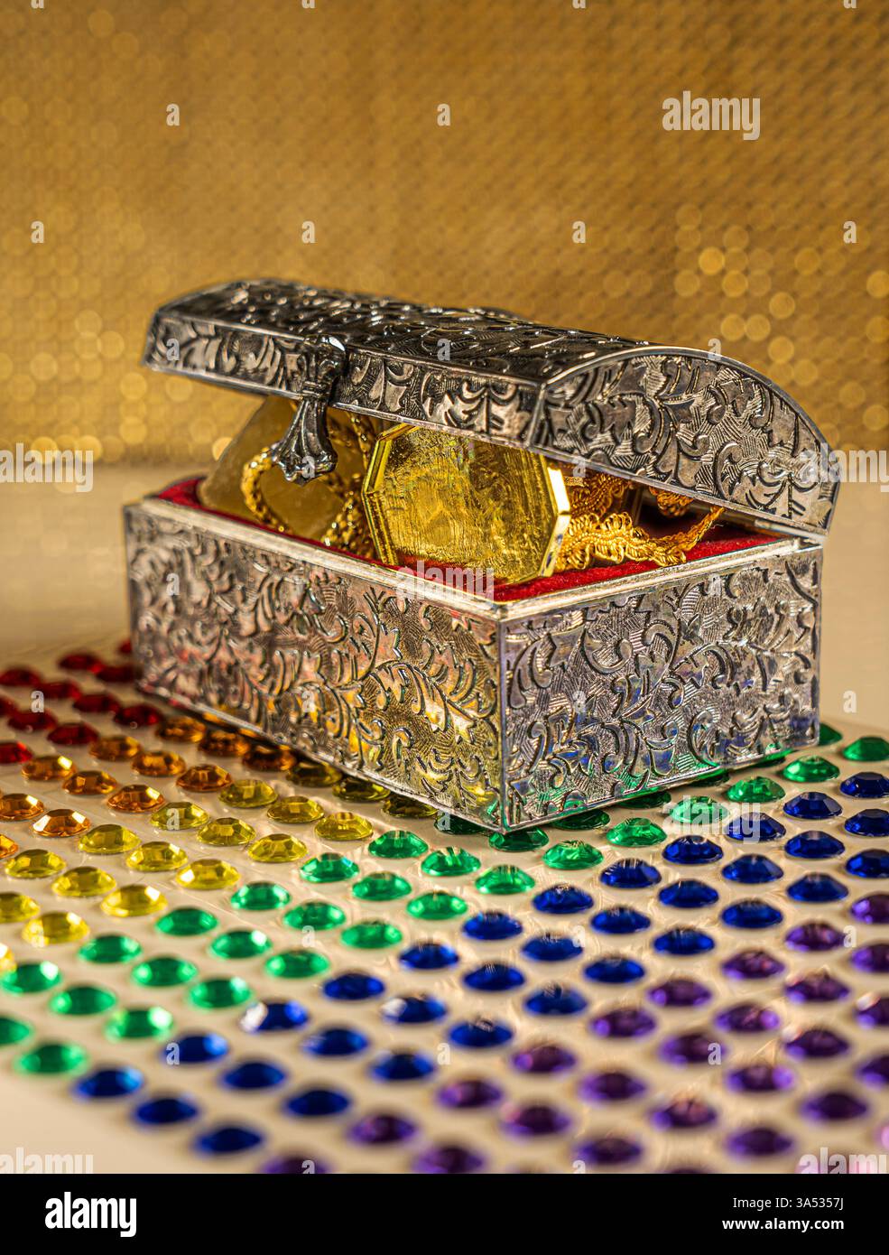 Treasure chest overflowing with gold coins and jewels hi-res stock ...