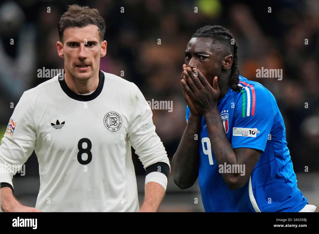 Italy's Moise Kean, right, reacts after missing a scoring chance during ...