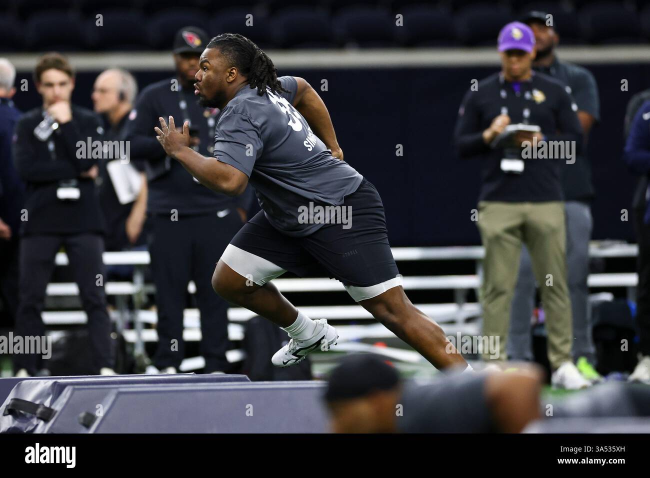 Iowa State defensive lineman JR Singleton runs in a drill during the ...