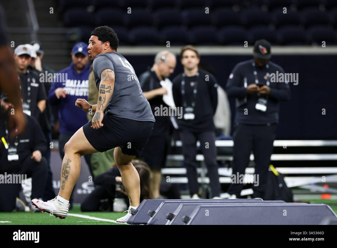 Utah defensive lineman Tevita K. Fotu runs in a drill during the Big 12 ...